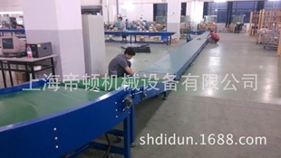 厂家直销斜坡爬升皮带输送机 碳钢提升输送线 结构紧凑 美观大方 阿里巴巴