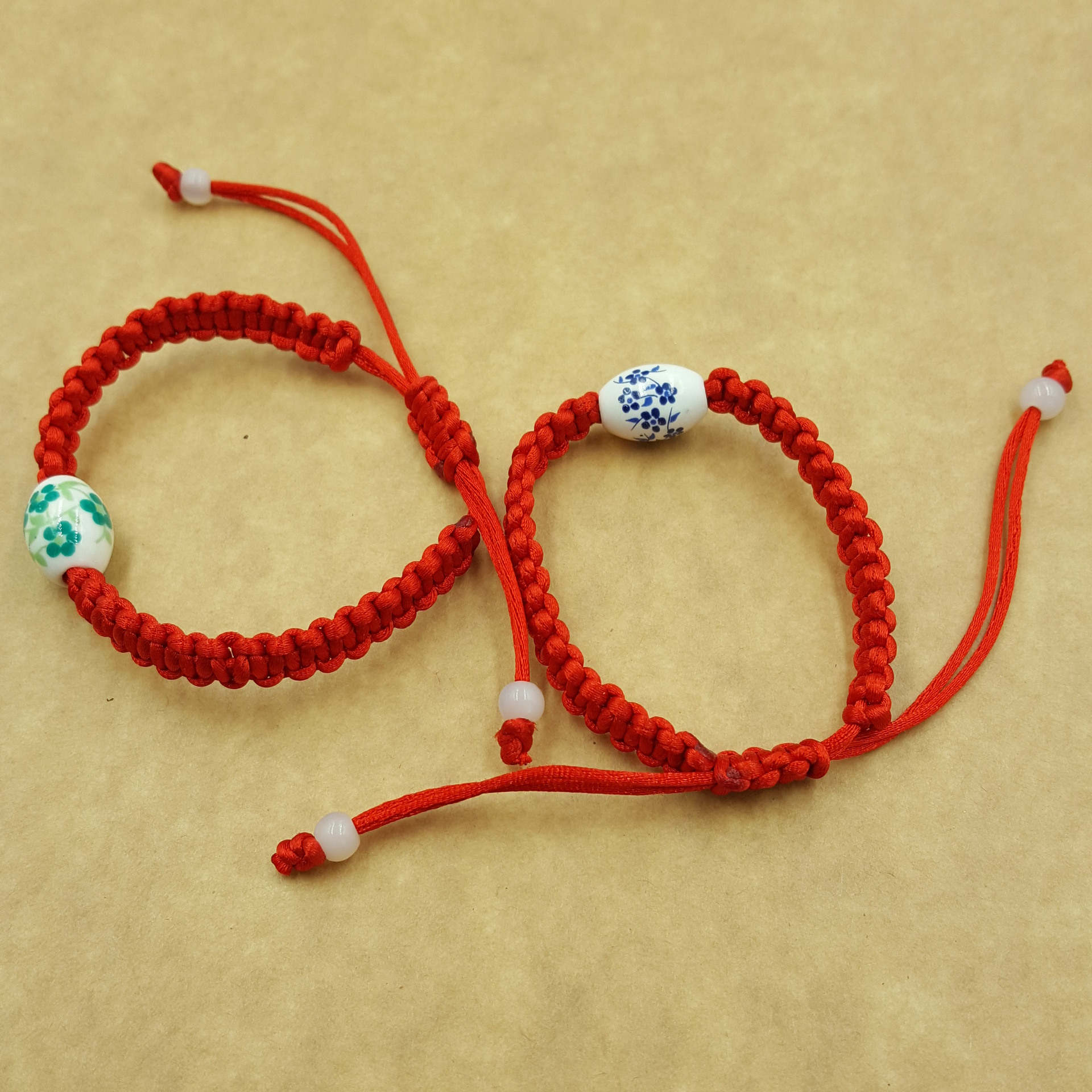 地摊爆款手工编织水晶玉石红绳手链脚链两元店爆款铜钱镀金手链-阿里巴巴