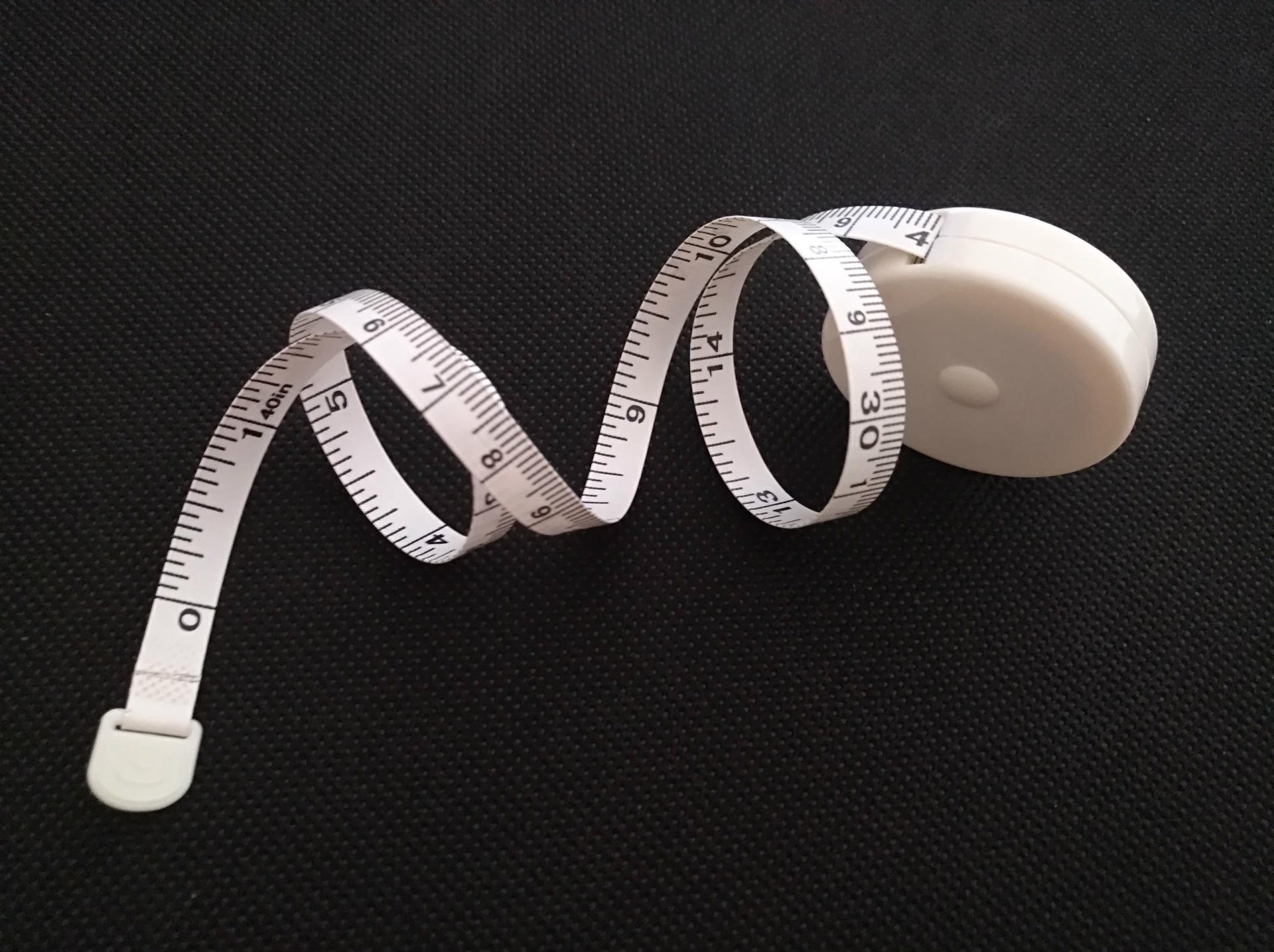 行选40mm圆形小卷尺塑料白色迷你公英制1米家居日常量衣三围软尺-阿里巴巴