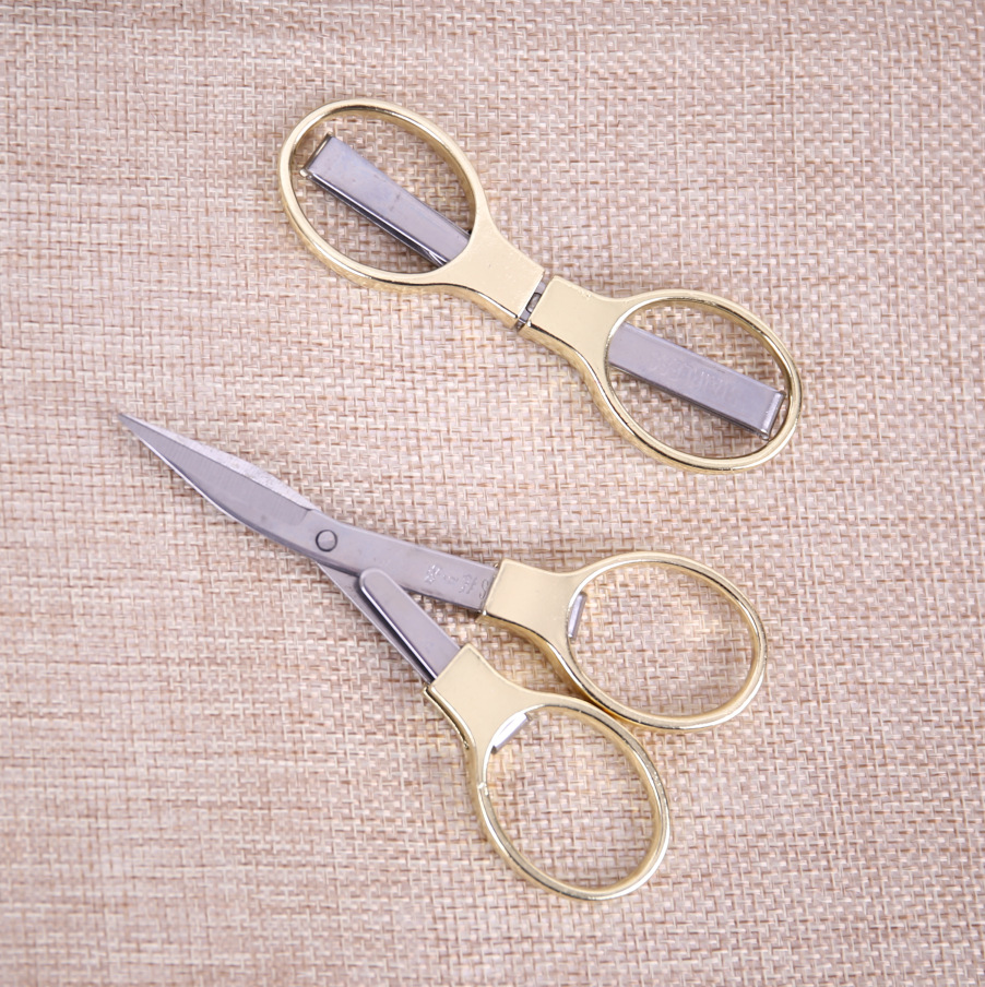 张小泉 不锈钢锻造拉伸式旅行剪刀 折叠携带方便锋利小轻巧888-阿里巴巴