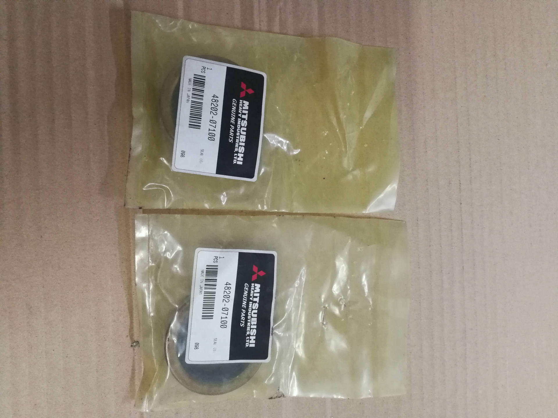 供应三菱S12A2-PTA发电机组前盖油封48202-07100-阿里巴巴
