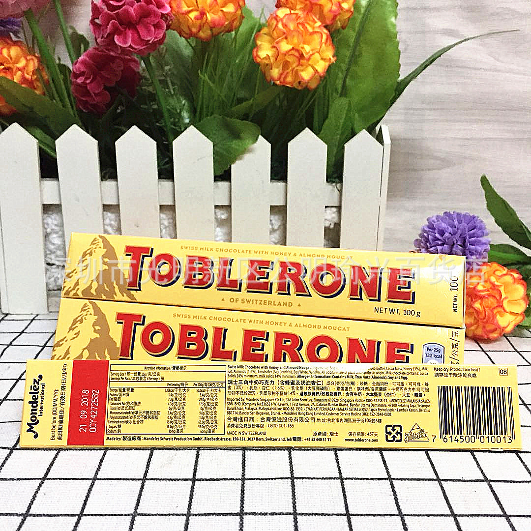 批发 瑞士进口Toblerone三角牛奶巧克力休闲零食品100g一盒20条-阿里巴巴