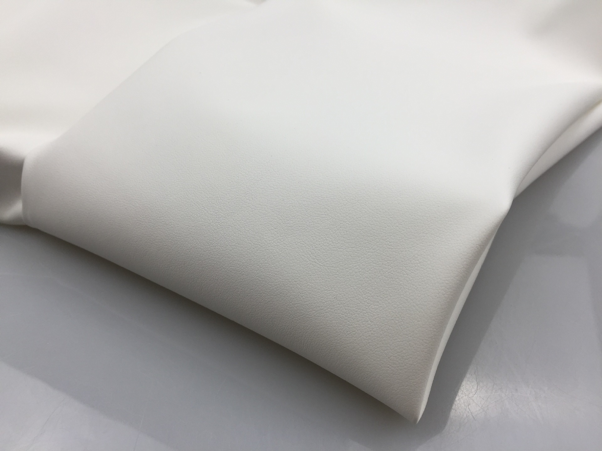 批发 PU皮革弹力DE43柔软平弹纸纹面料耳机皮套软包礼盒电子包装-阿里巴巴