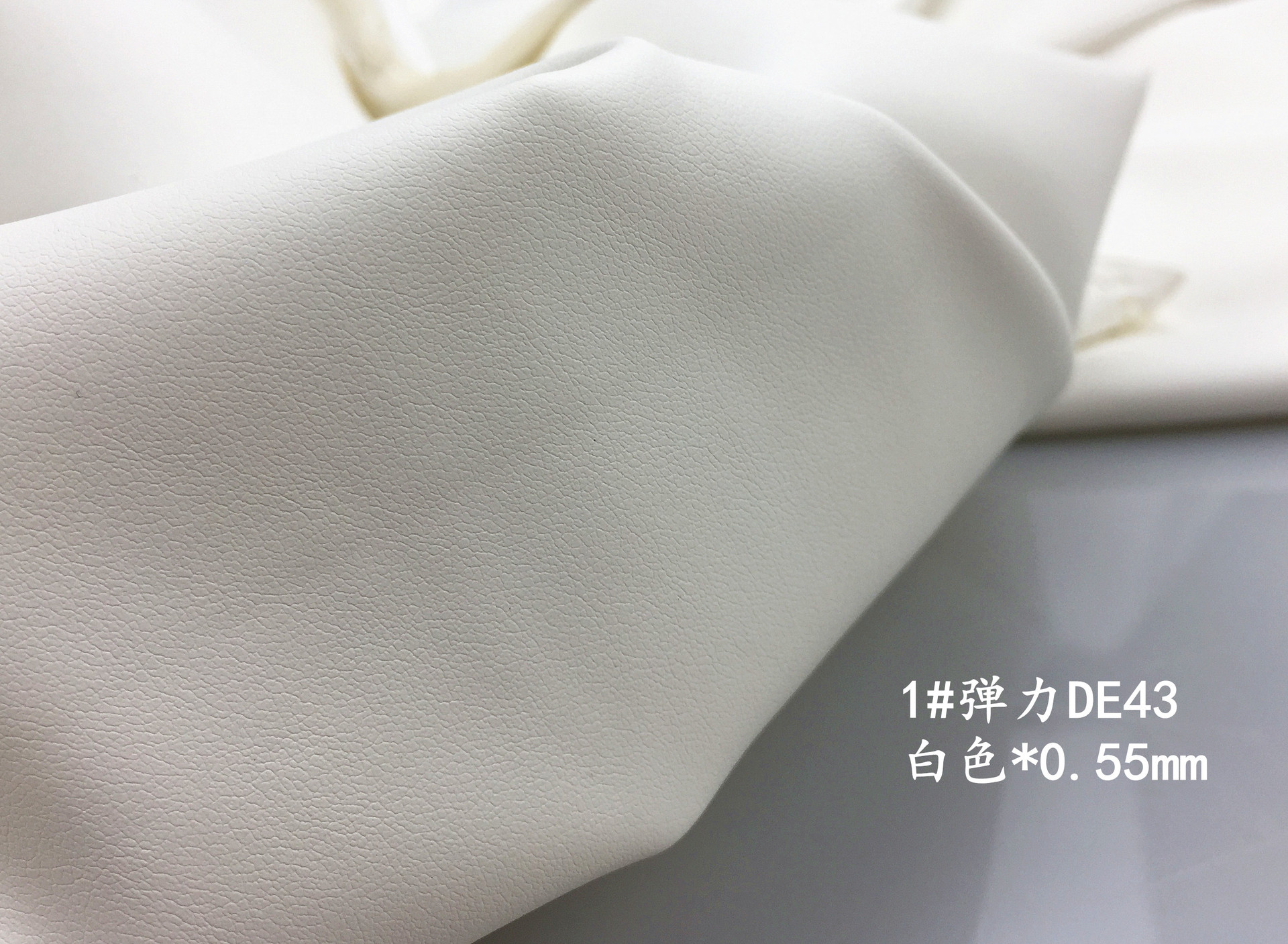 批发 PU皮革弹力DE43柔软平弹纸纹面料耳机皮套软包礼盒电子包装-阿里巴巴