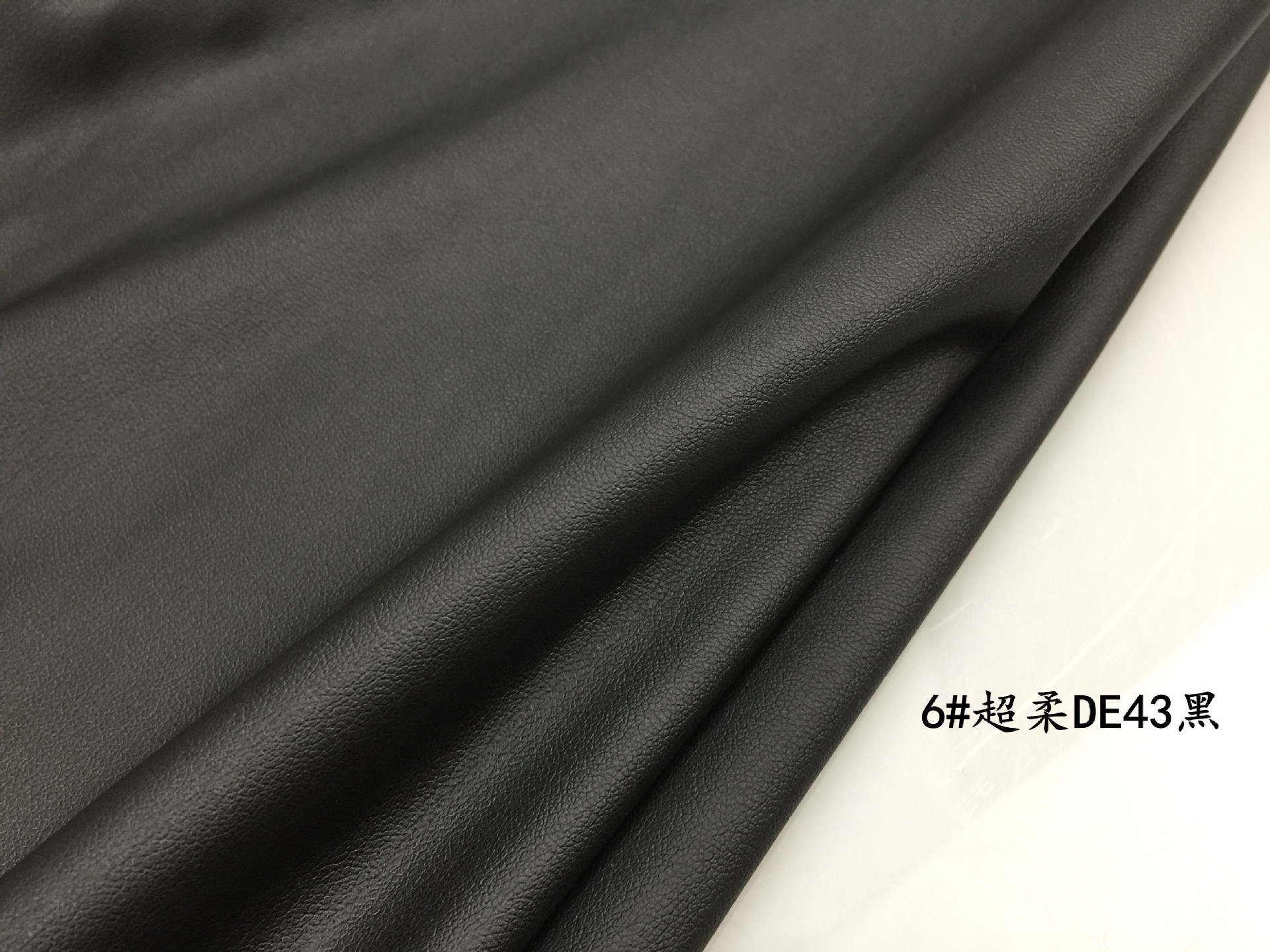 批发 PU皮革弹力DE43柔软平弹纸纹面料耳机皮套软包礼盒电子包装-阿里巴巴