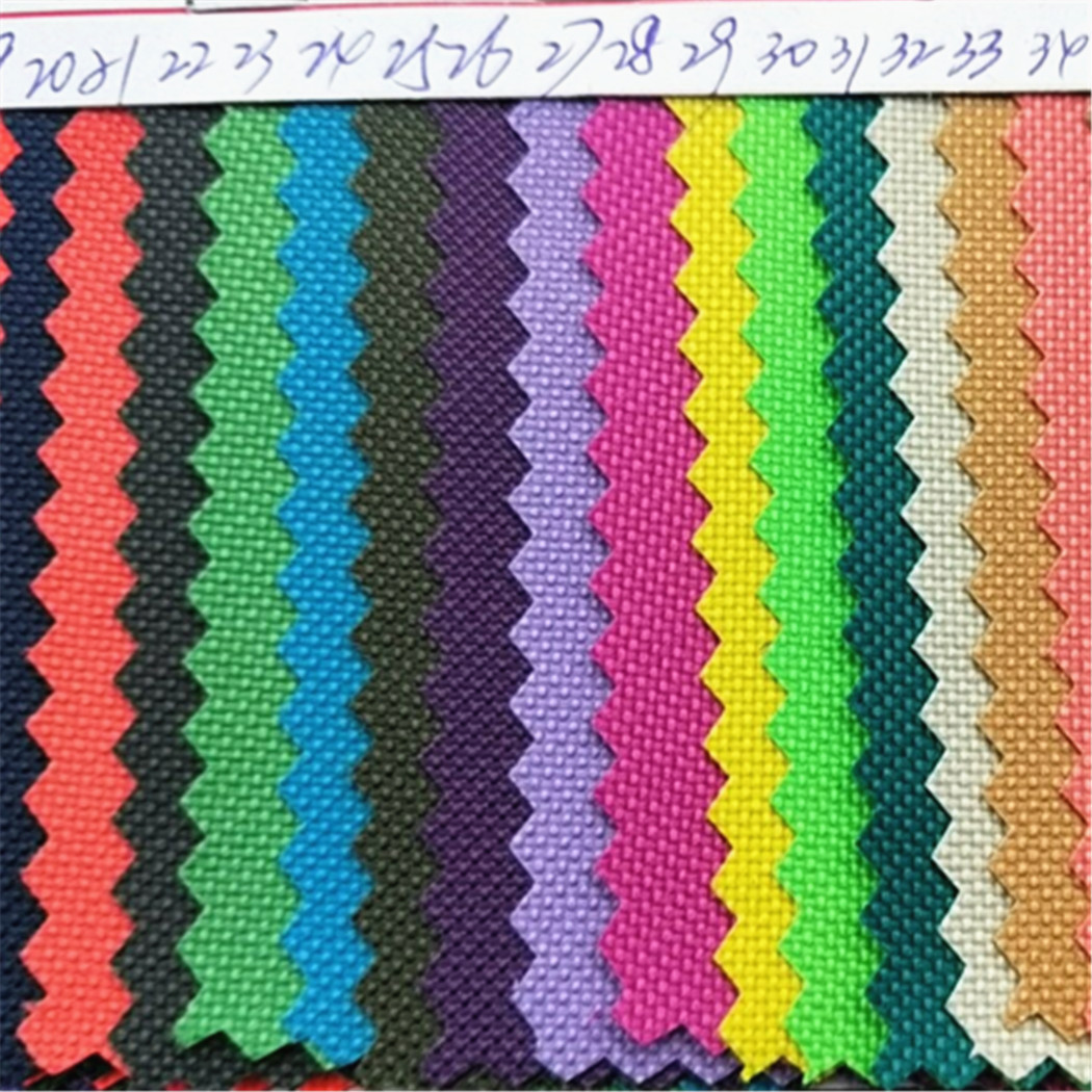 现货供应600D高弹PVC牛津布箱包手袋面料耐磨抗拉手搓不起白-阿里巴巴