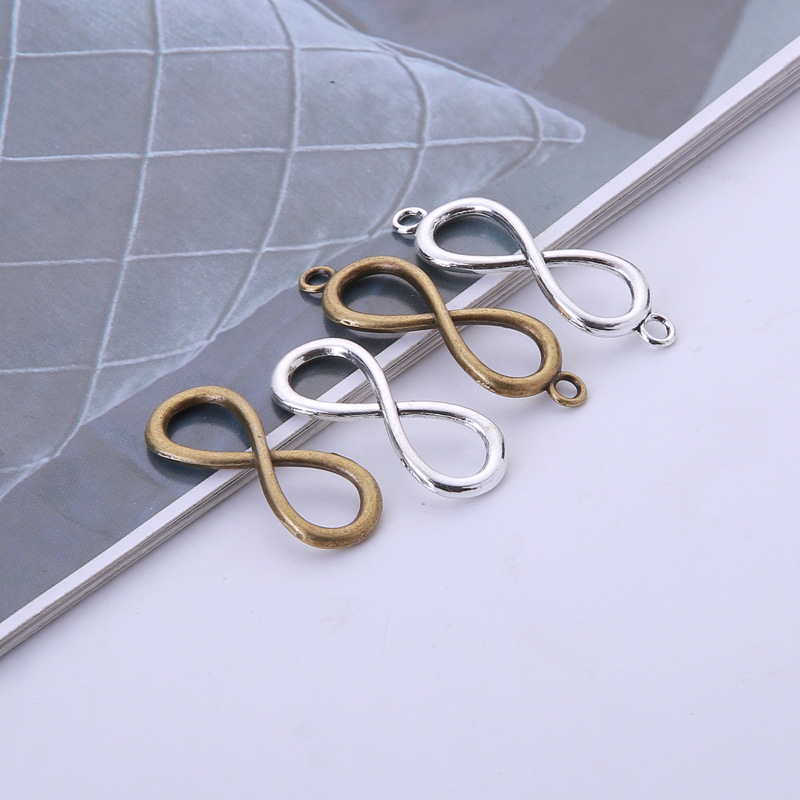 50 Pieces / Bag Mixed Vintage Metal Infinite Letter Connecting Pendant ...