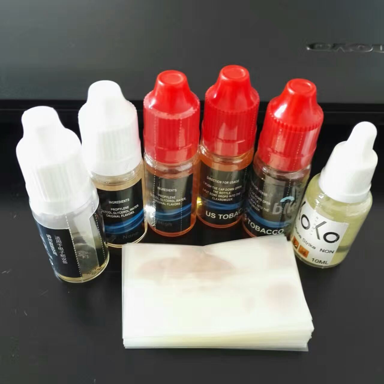 厂家直销高透明PVC烟油瓶收缩膜 优质两头通精油瓶封口热收缩膜-阿里巴巴