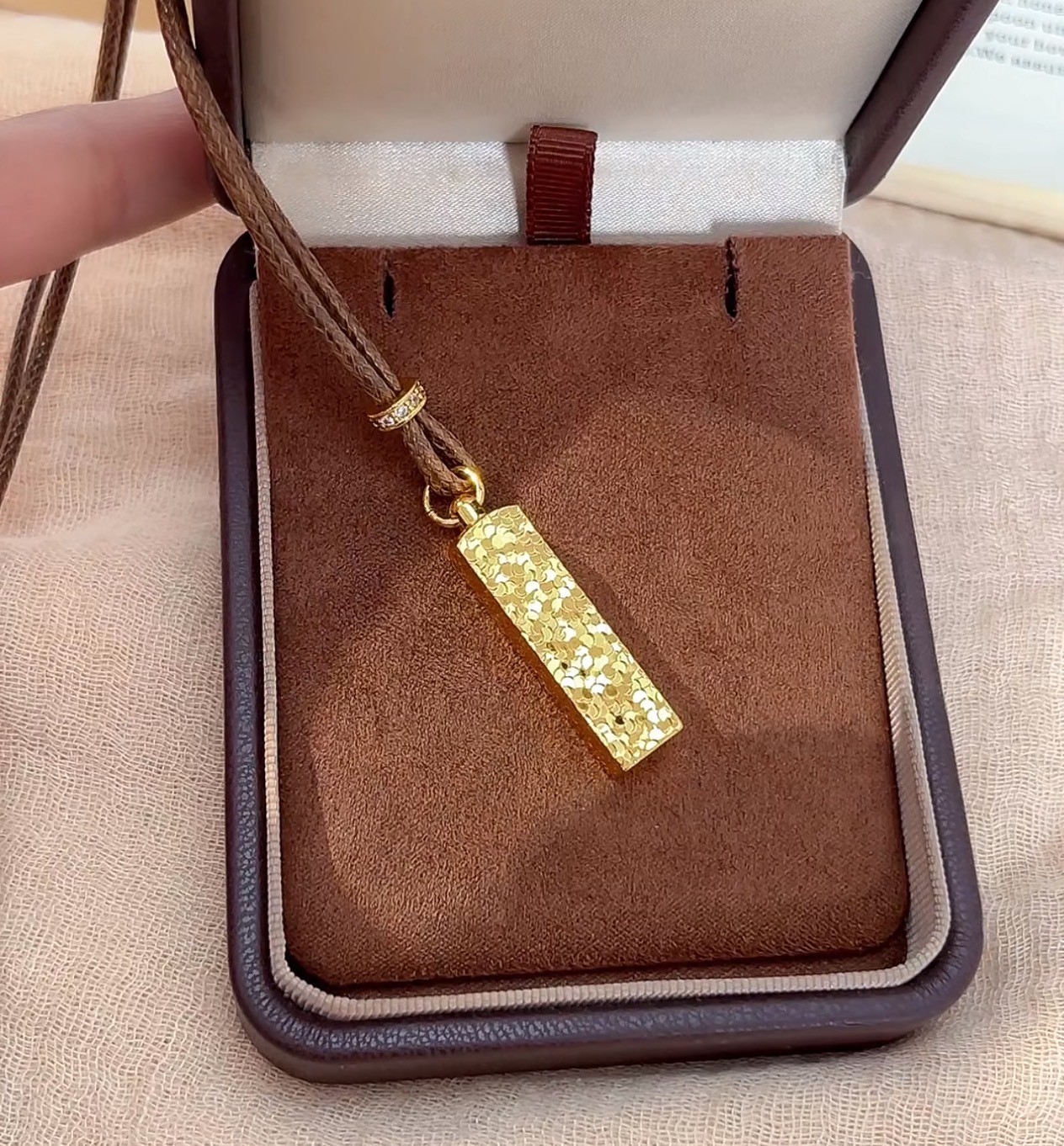 纯银S925新中式国风轻奢CNC工艺碎冰冰四方来财小金块棕绳项链-阿里巴巴