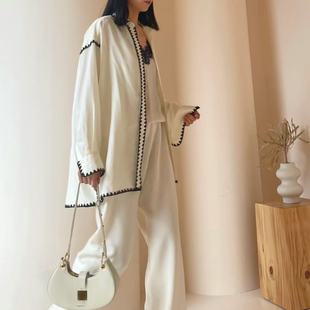 北欧TOT舒适透气真丝衬衫女简约设计勾边刺绣中长款长袖廓形衬衣-阿里巴巴