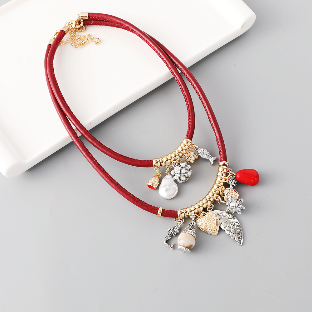 欧美跨境新款个性皮革爱心珍珠吊坠项链秋冬季百搭毛衣链热销款-阿里巴巴