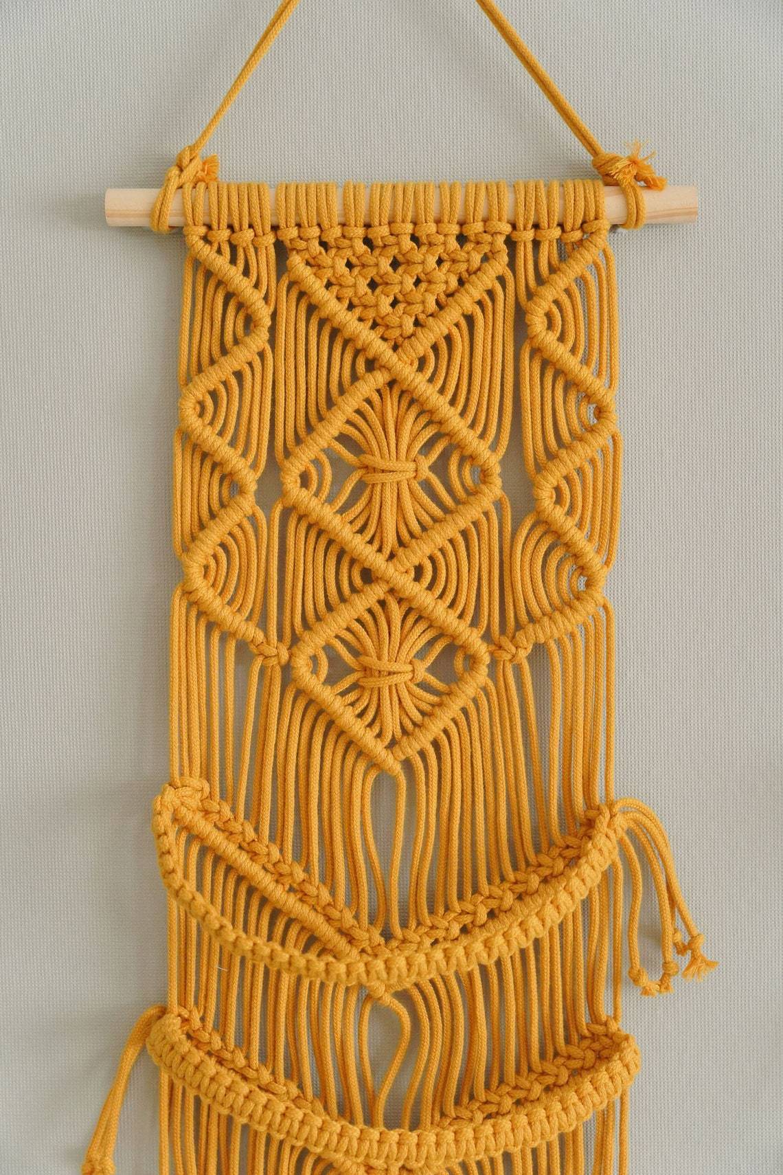 亚马逊新款 手工编织挂毯鸭舌帽收纳壁挂式帽架 波西米亚家居装饰-阿里巴巴