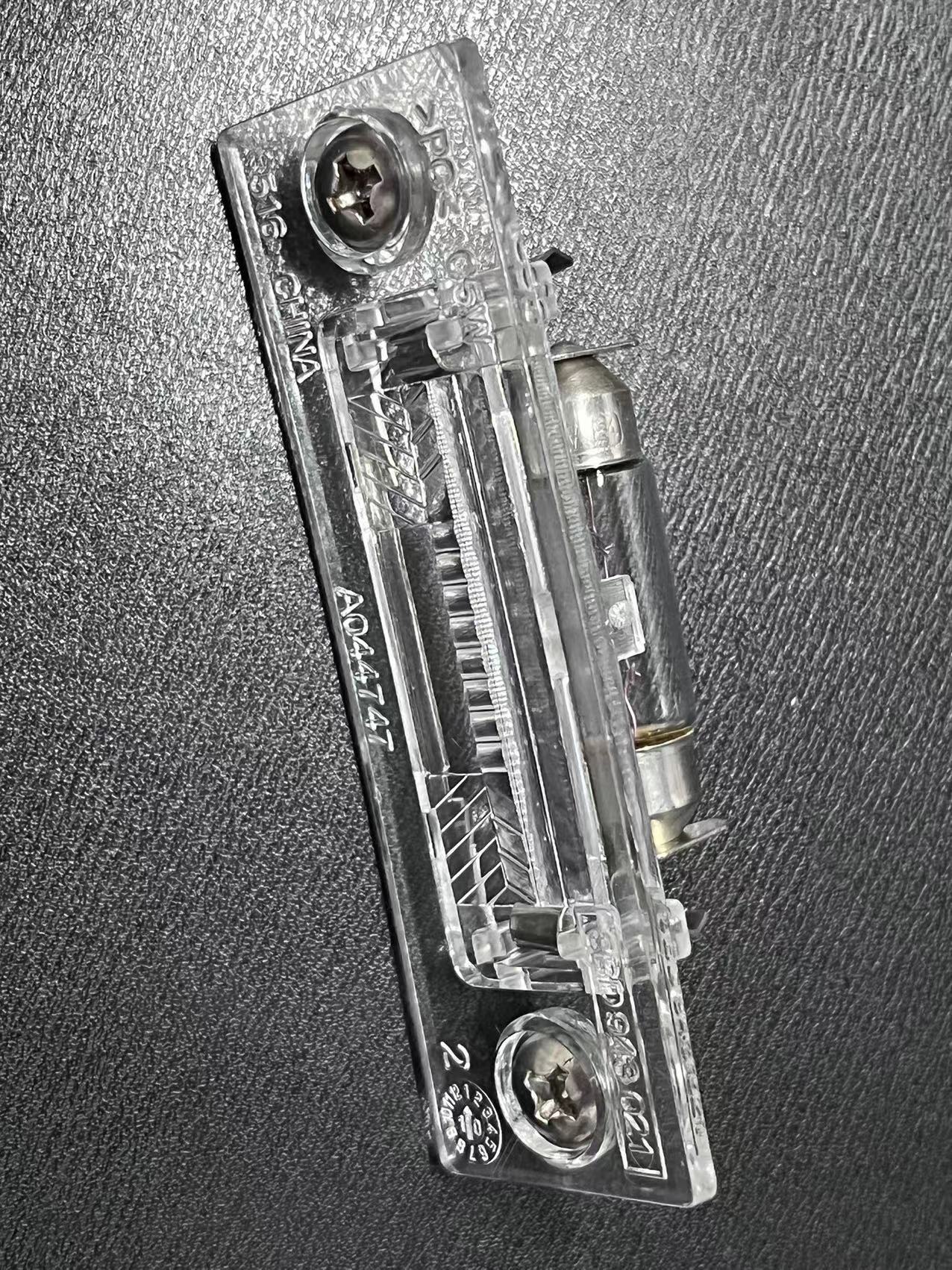 外销用帕萨特领驭老速腾途安牌照保护盖行李箱扣手护盖3BD943021-阿里巴巴