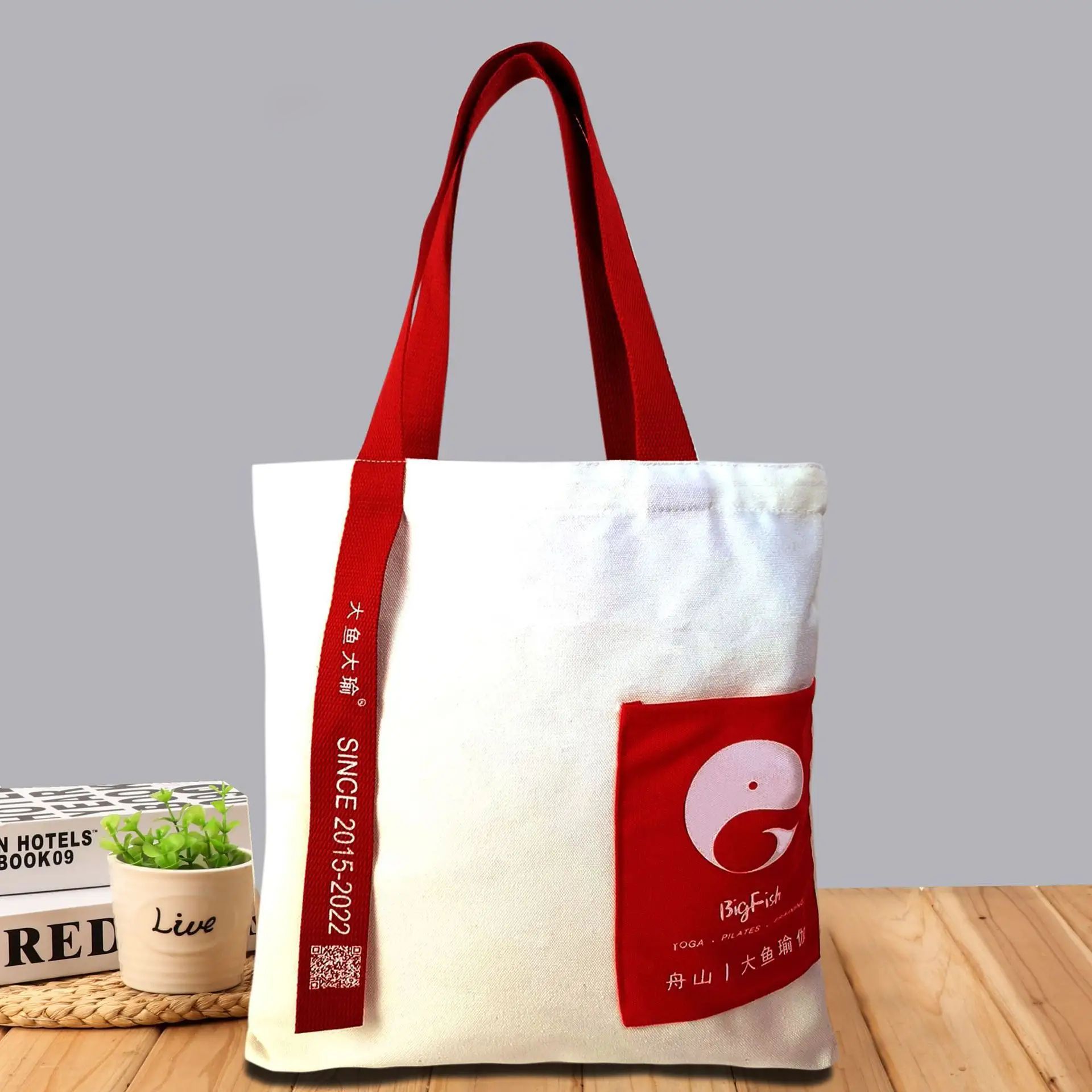 立体帆布包飘带款定制手提托特包印制logo广告宣传单肩加厚帆布袋-阿里巴巴