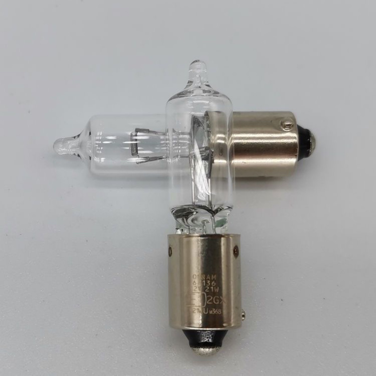 欧司朗 OSRAM 64136 12V H21W E1汽车转向后雾倒车灯泡斜角速腾CC-阿里巴巴