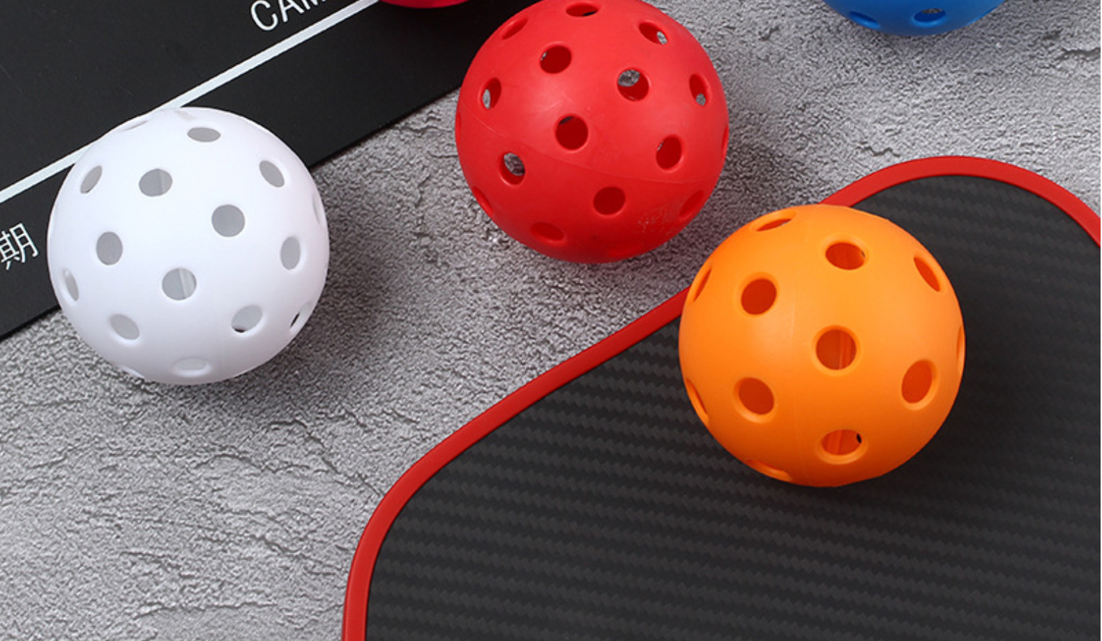 批发比赛匹克球多色洞洞球TPE弹性注塑球室内球40孔室外球可定 制-阿里巴巴