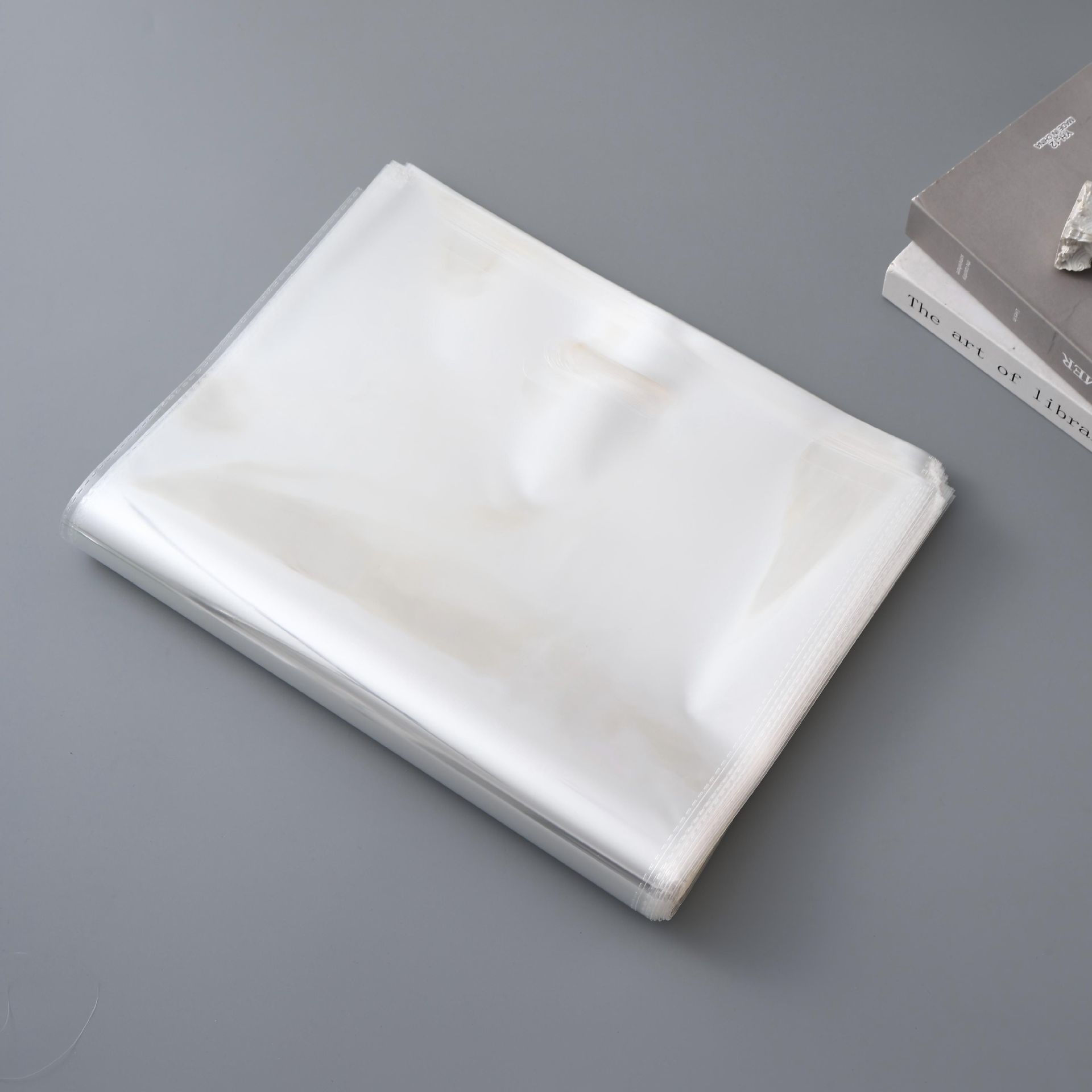 现货opp自粘袋透明饰品手提孔袋 服装书本袜子包装袋卡头平口袋-阿里巴巴