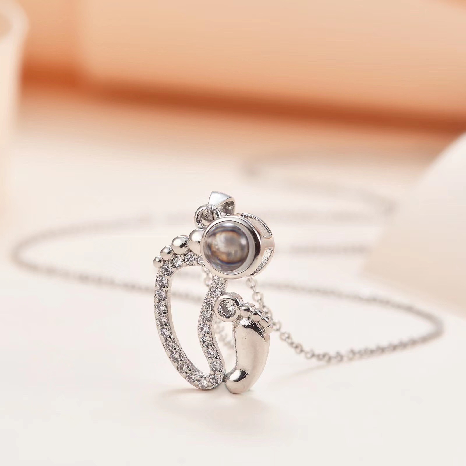 跨境新品 S925银爱的脚印投影项链女100种语言银饰品吊坠女锁骨链-阿里巴巴