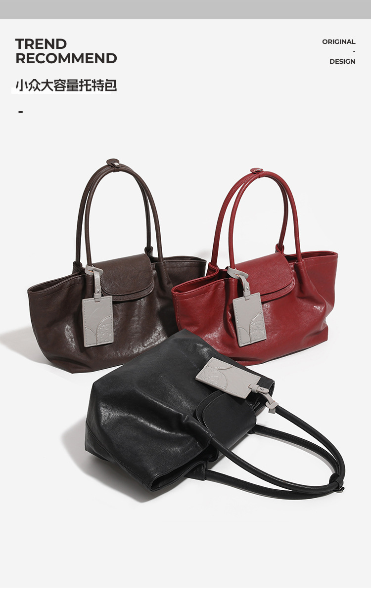 KoniKoni真皮小众黑色大容量托特包女2025新款通勤手提包单肩大包-阿里巴巴