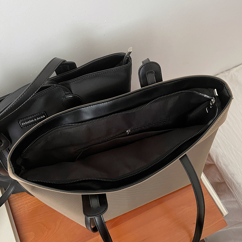 大容量包包女2025新款小众设计百搭单肩大包休闲手提通勤托特包潮-阿里巴巴