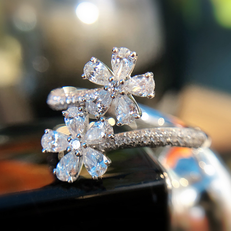时尚女人名媛ins风花朵戒指 pt950水滴梨形仿真锆石戒指钻戒女戒-阿里巴巴