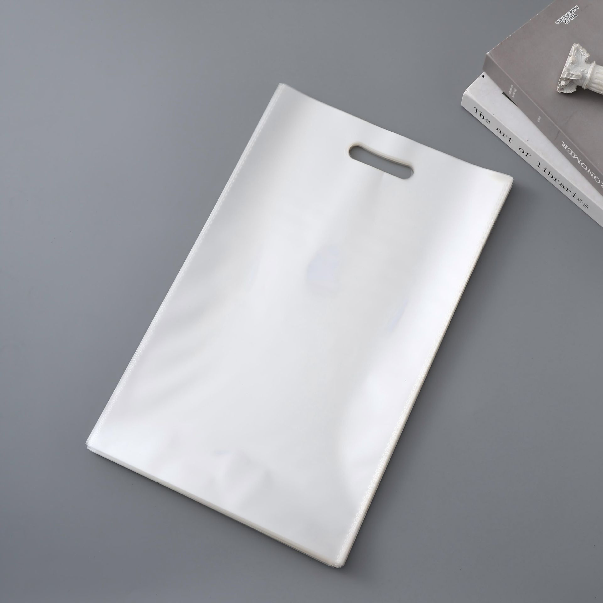 现货opp自粘袋透明饰品手提孔袋 服装书本袜子包装袋卡头平口袋-阿里巴巴