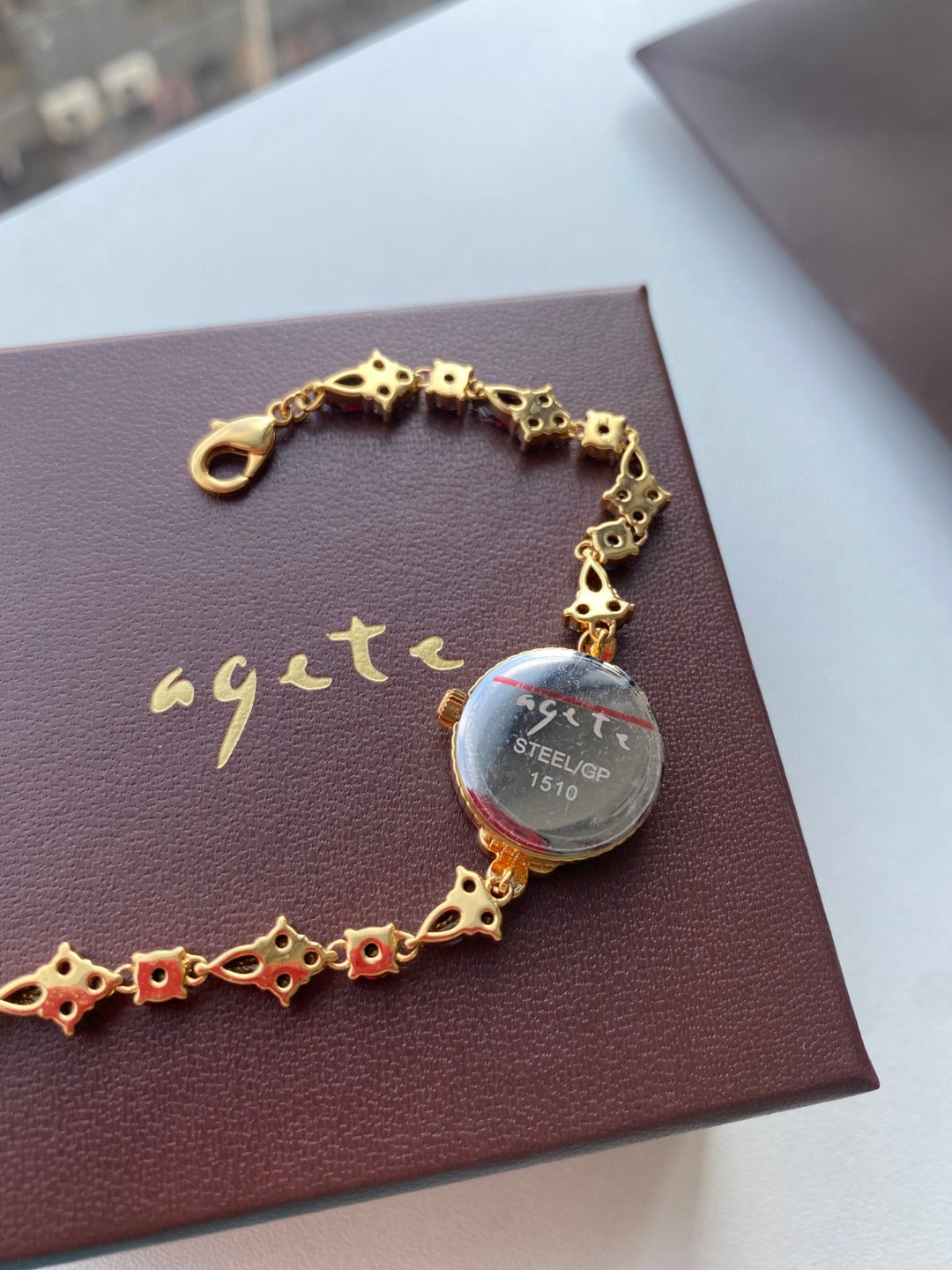 年度爆款日本Agete天然石榴石圆盘小表气质时尚复古手链石英女表-阿里巴巴